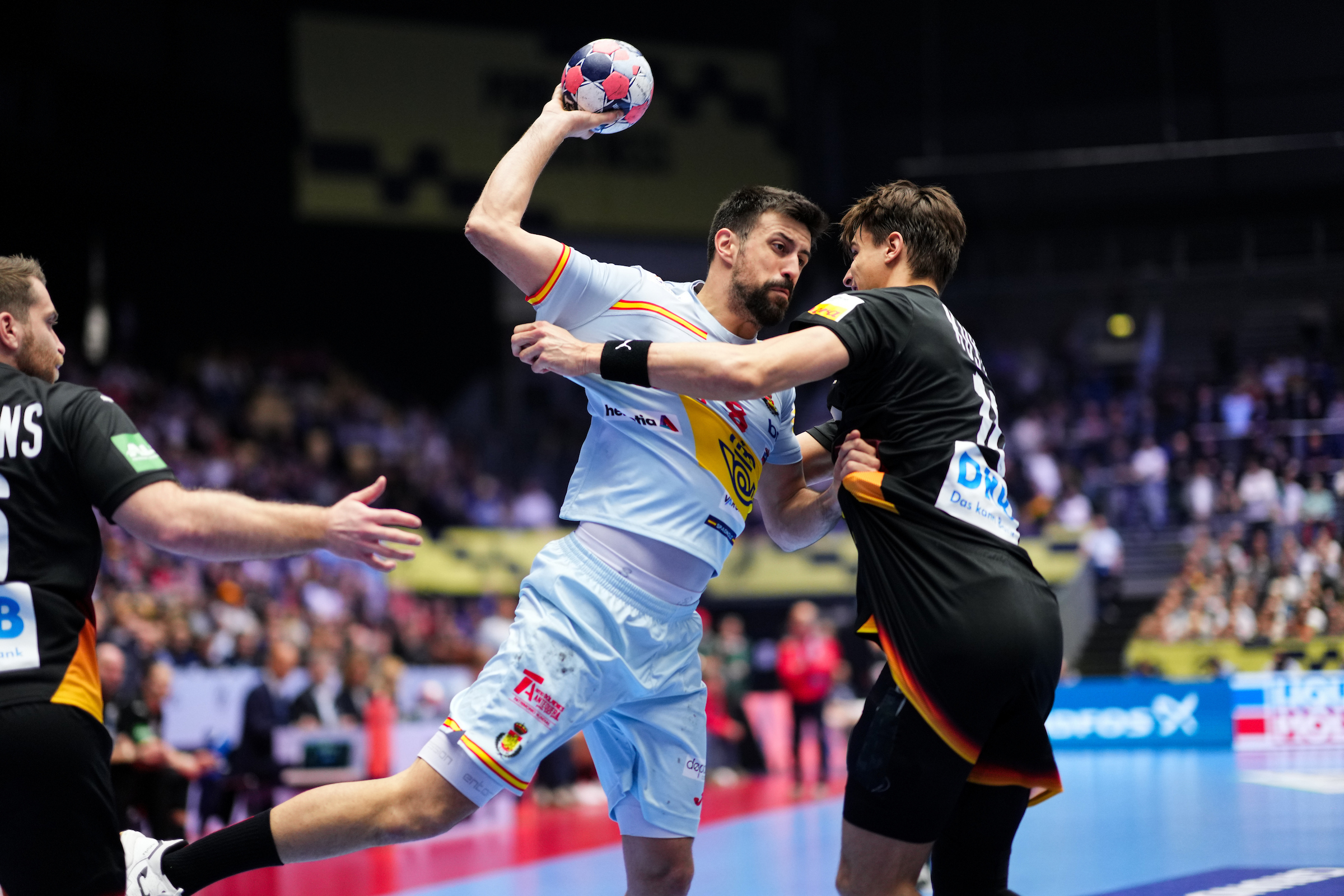 Germany join Spain in the main round after a spectacular battle
